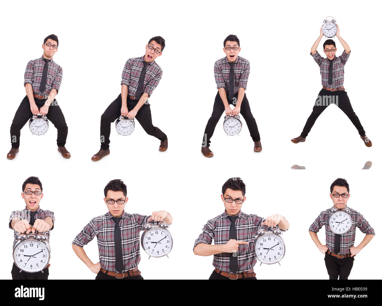 Young man with clock isolated on white Stock Photo - Alamy