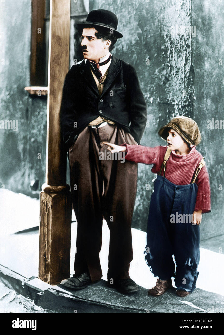 THE KID, (from left): Charles Chaplin, Jackie Coogan, 1921 Stock Photo ...