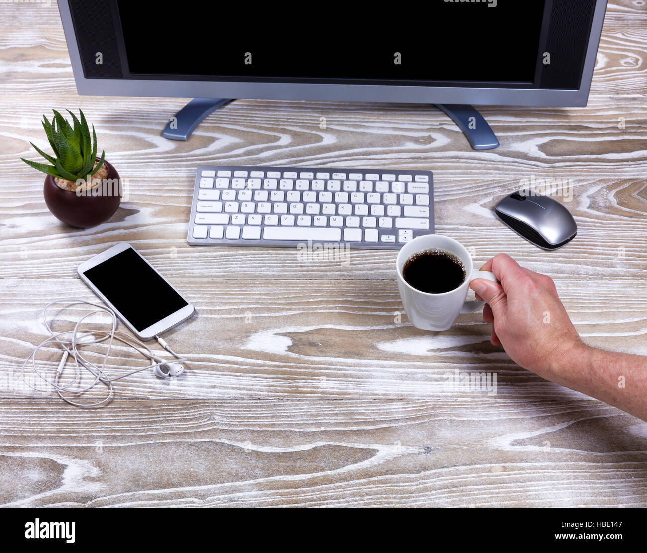 Cup of coffee at the workplace Stock Photo - Alamy