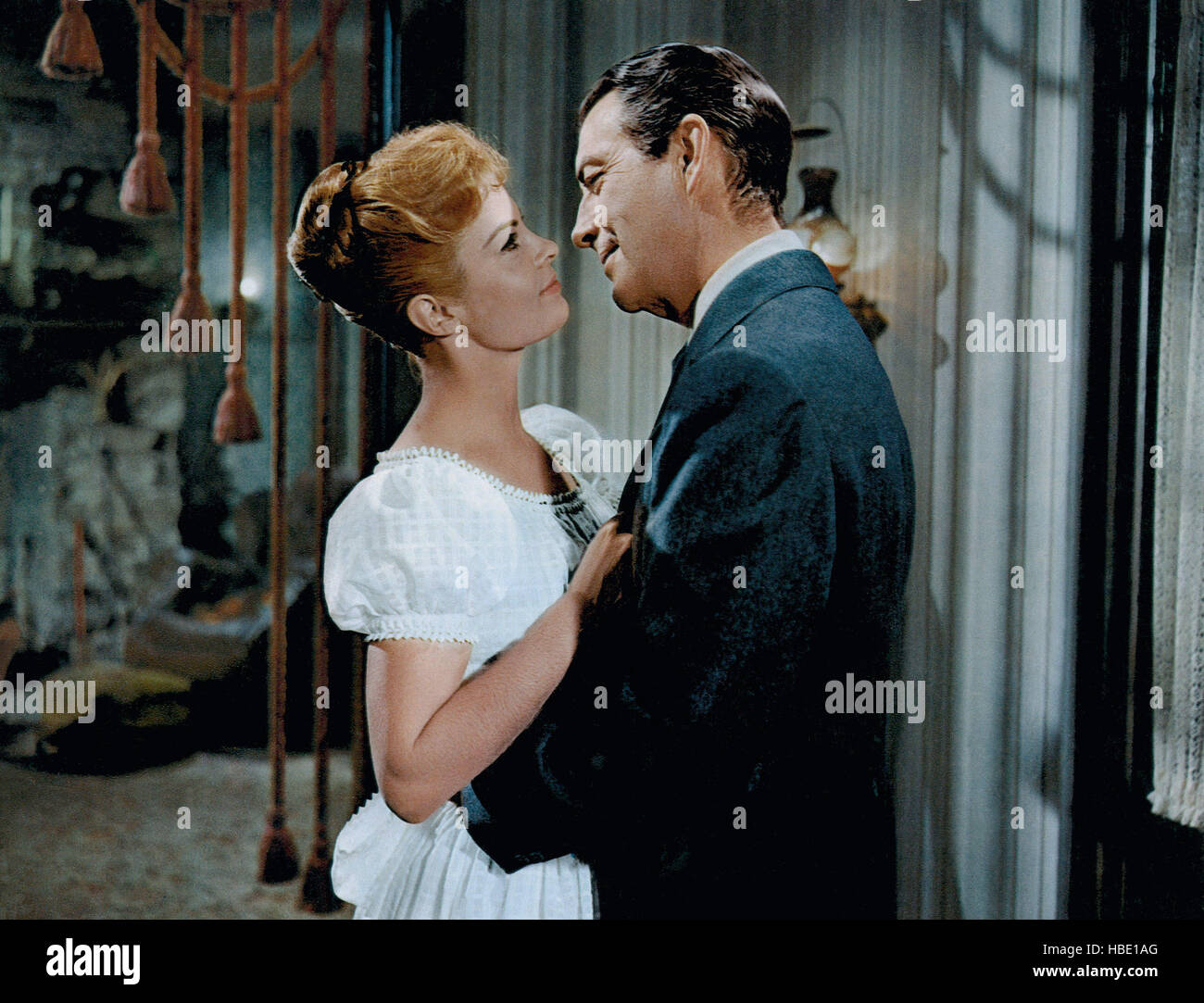 THE LAW AND JAKE WADE, Patricia Owens, Robert Taylor, 1958 Stock Photo ...