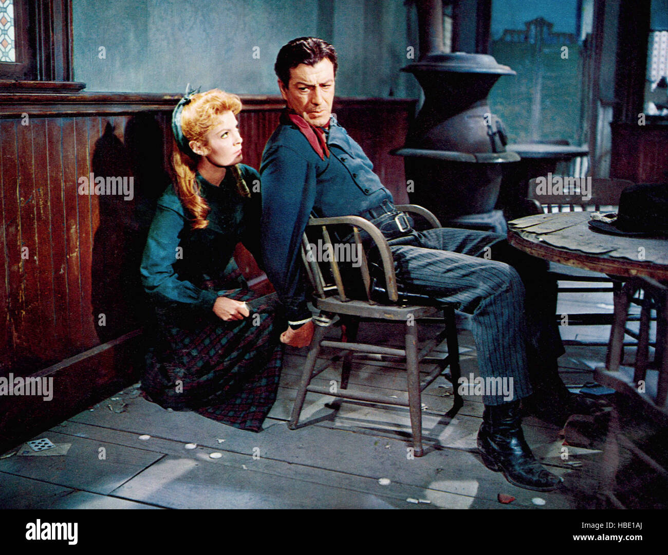 THE LAW AND JAKE WADE, Patricia Owens, Robert Taylor, 1958 Stock Photo ...