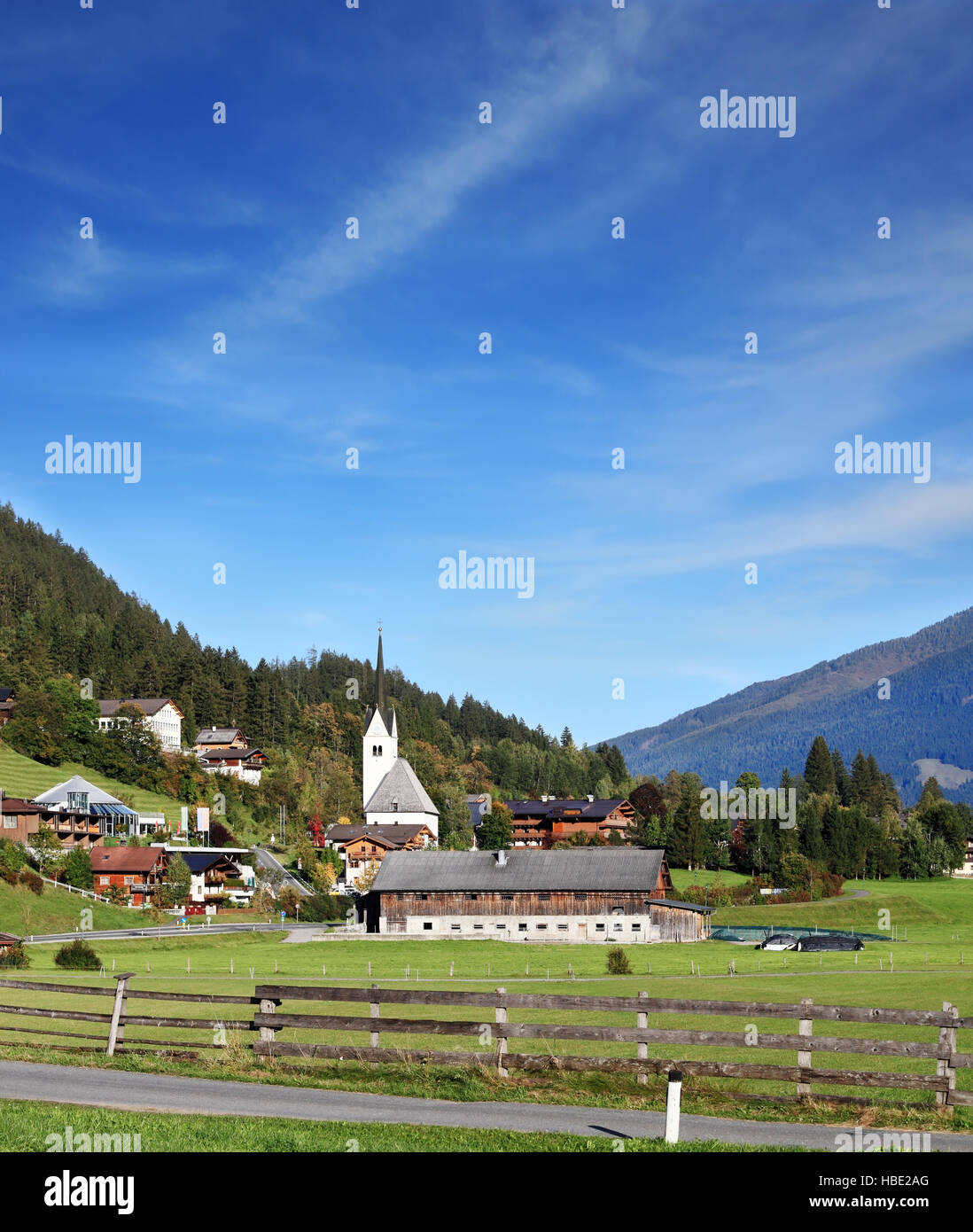 Picturesque houses in green valley Stock Photo - Alamy