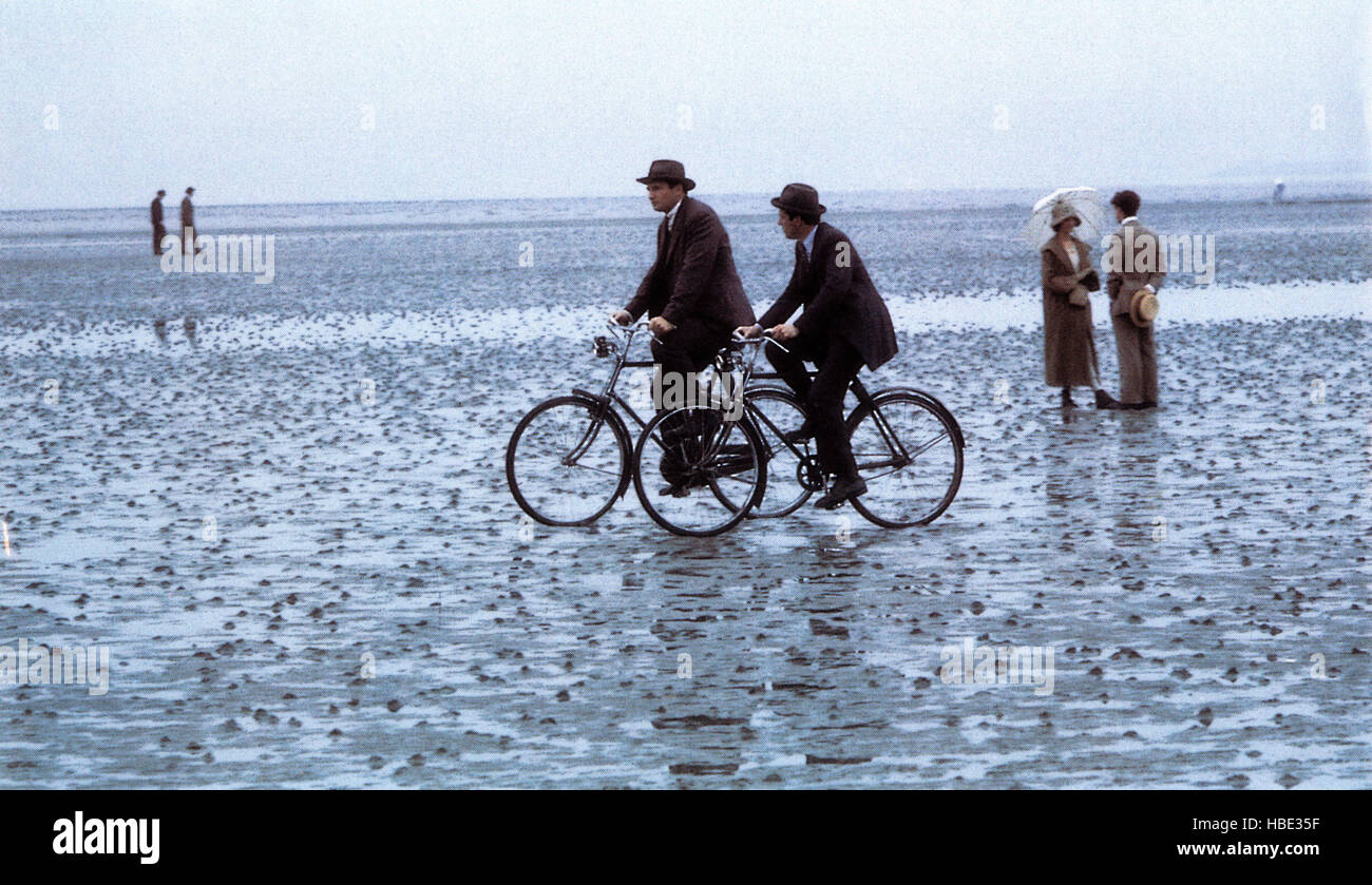 MICHAEL COLLINS, on bicycles from left: Liam Neeson, Aidan Quinn, 1996 ...