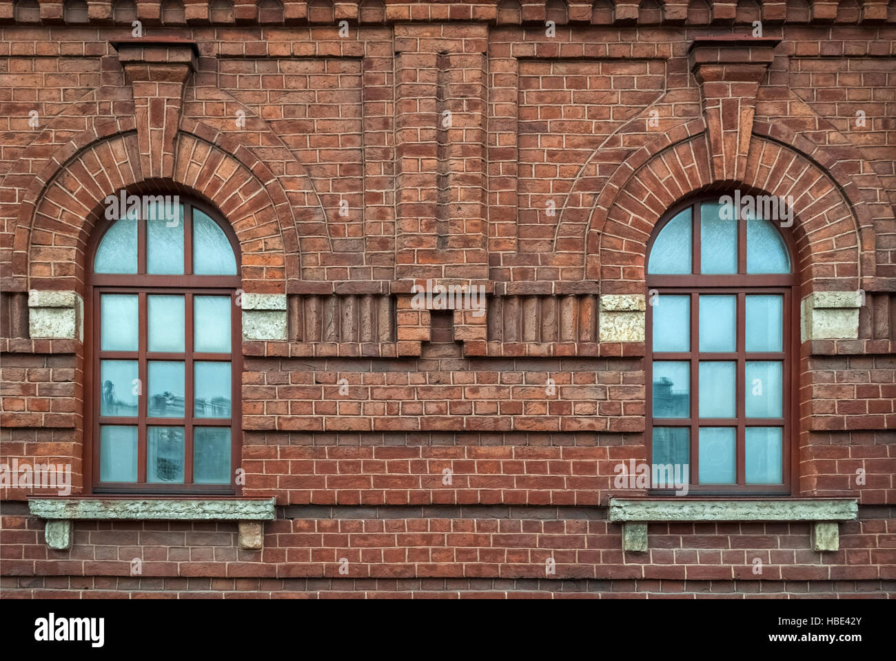 Two window on a brown wall Stock Photo - Alamy