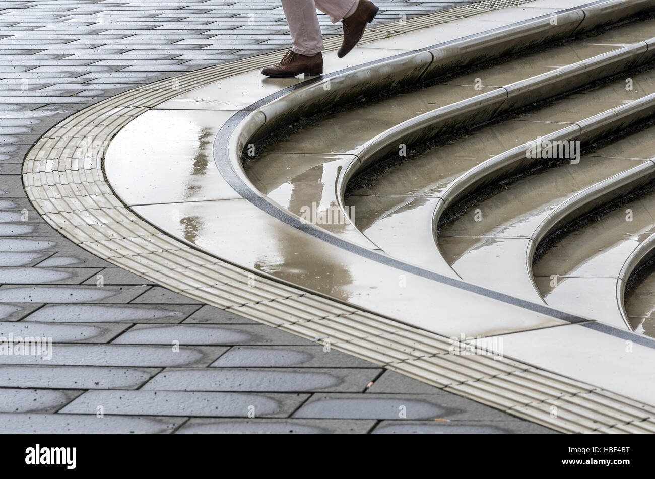 Steps in the rain Stock Photo - Alamy