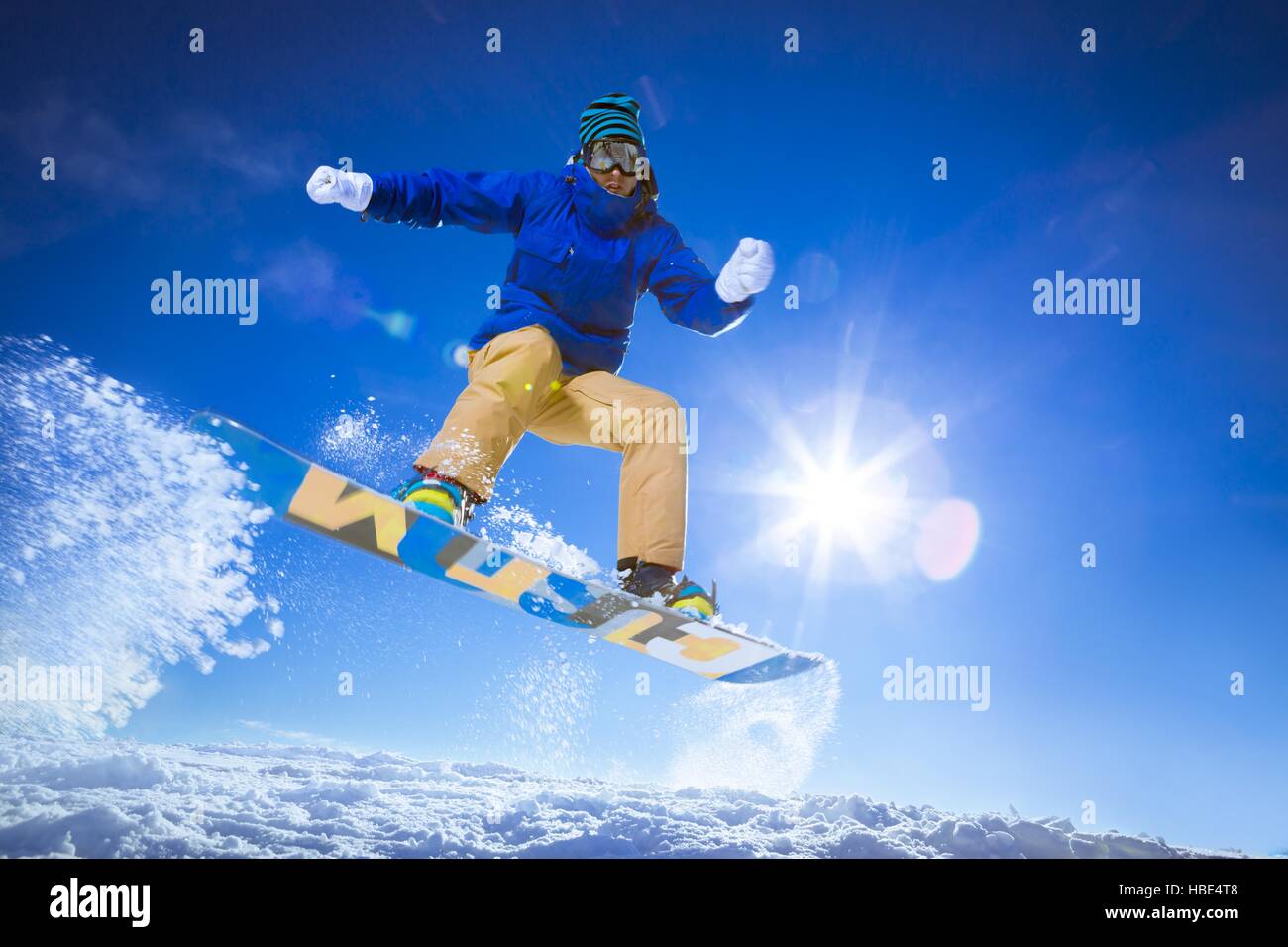 Athlete on a snowboard Stock Photo - Alamy