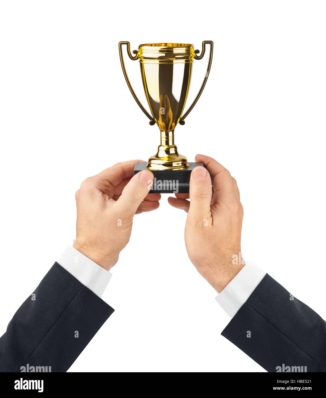 Golden trophy cup in hands Stock Photo - Alamy