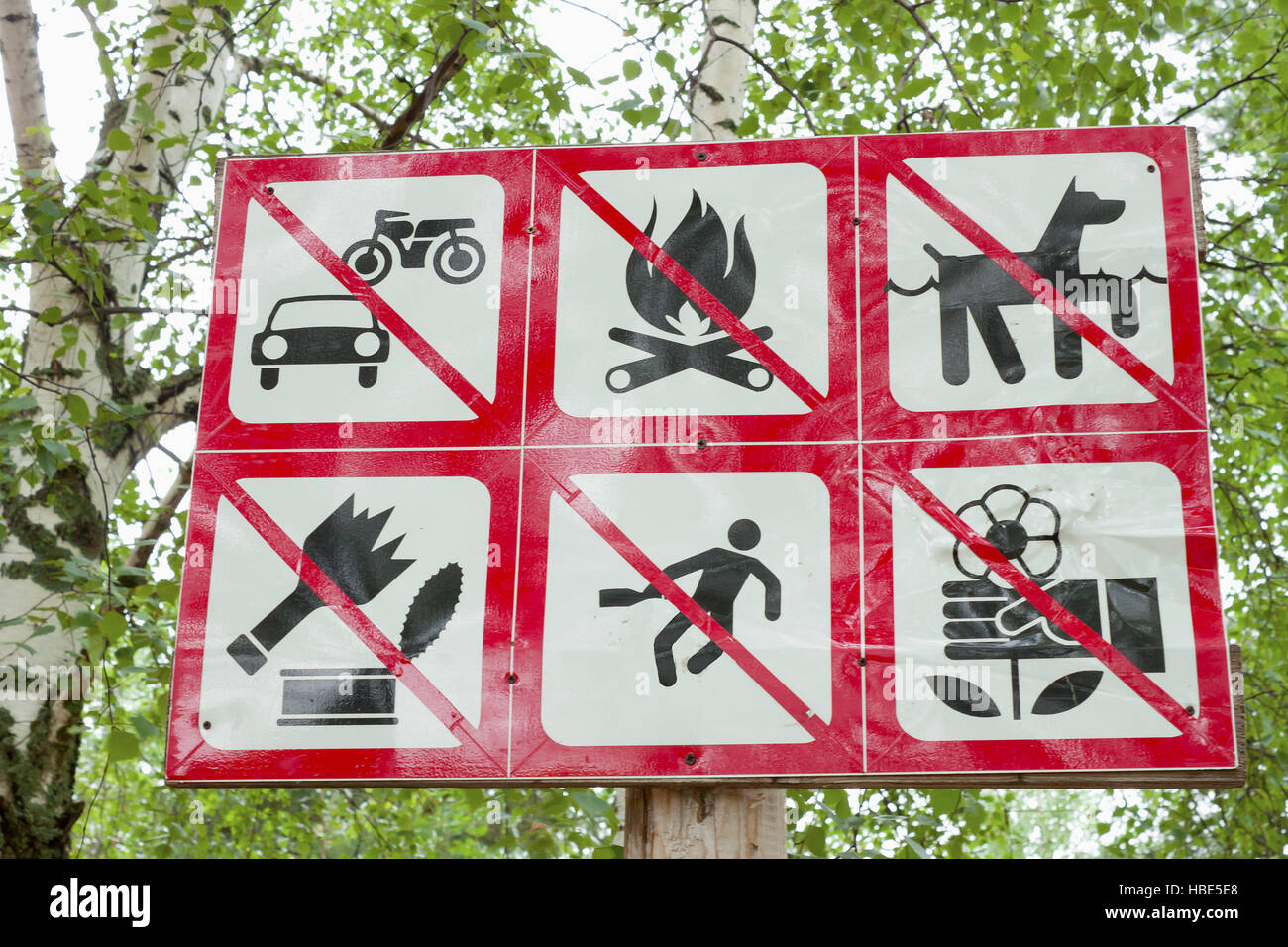 Prohibiting signs in the park Stock Photo - Alamy