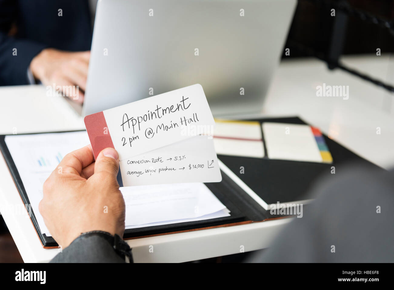Business Man Holding Appointment Note Concept Stock Photo - Alamy