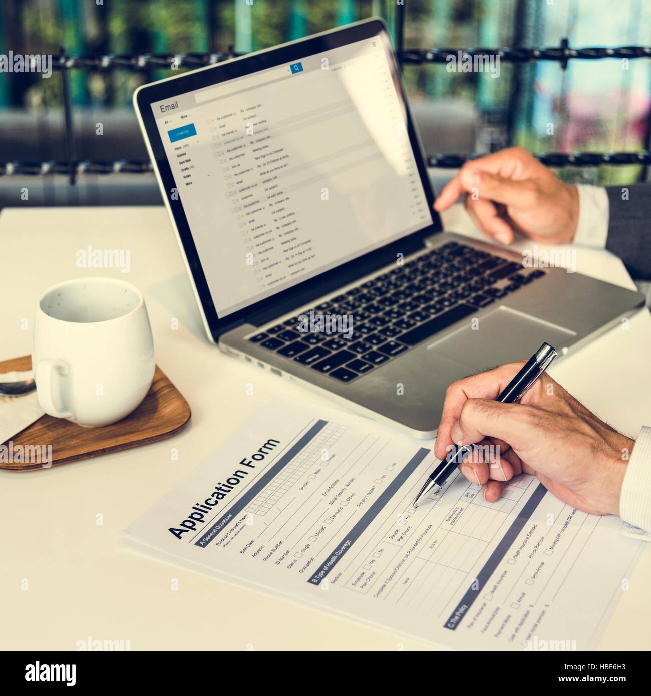 Business Hand Filling Out Application Form Concept Stock Photo - Alamy