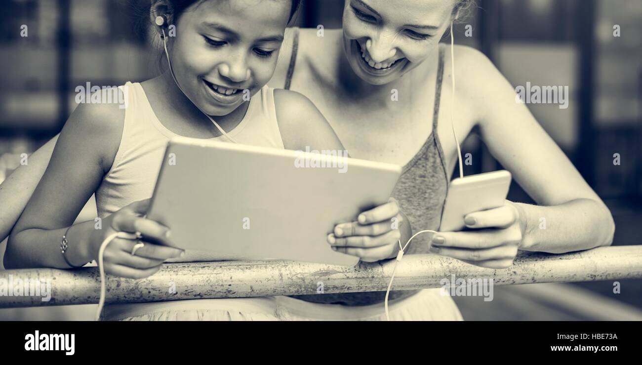 Ballet Dancer Using Device Concept Stock Photo - Alamy