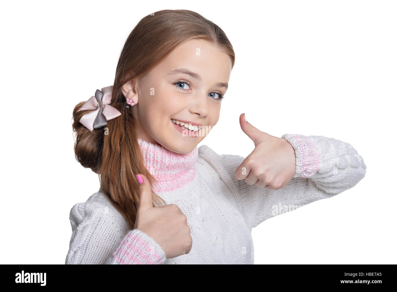 Girl showing thumbs up Stock Photo - Alamy