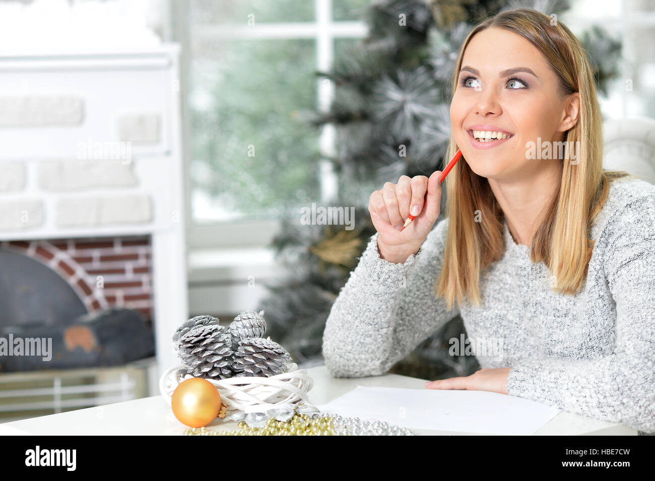Woman writing letter Stock Photo - Alamy