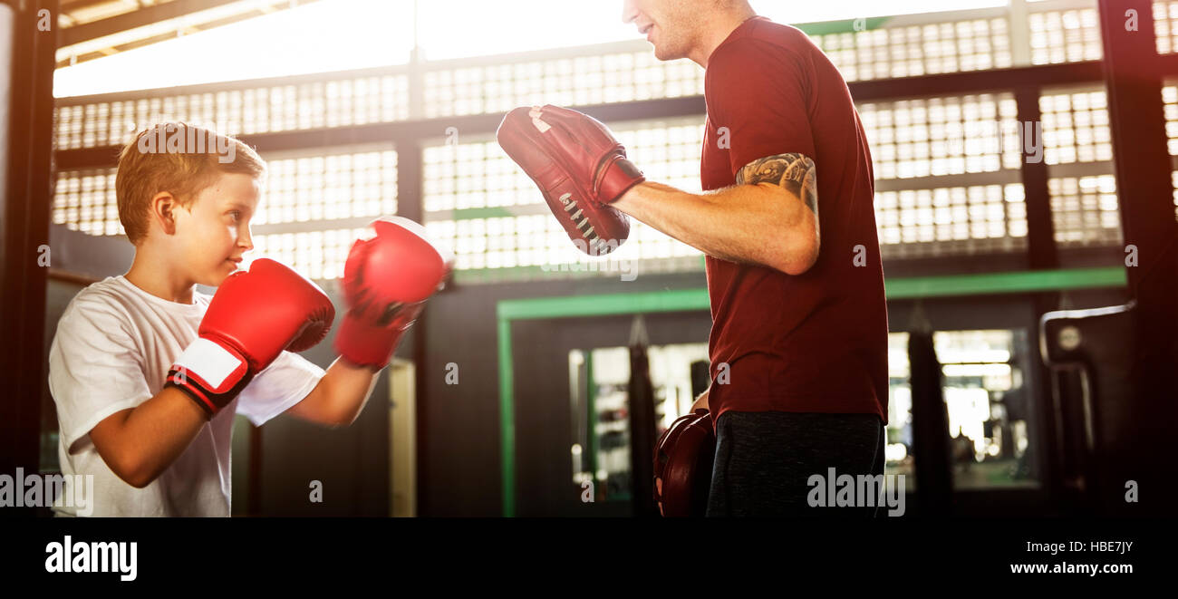 Boy Boxing Training Punch Mitts Exercise Concept Stock Photo - Alamy