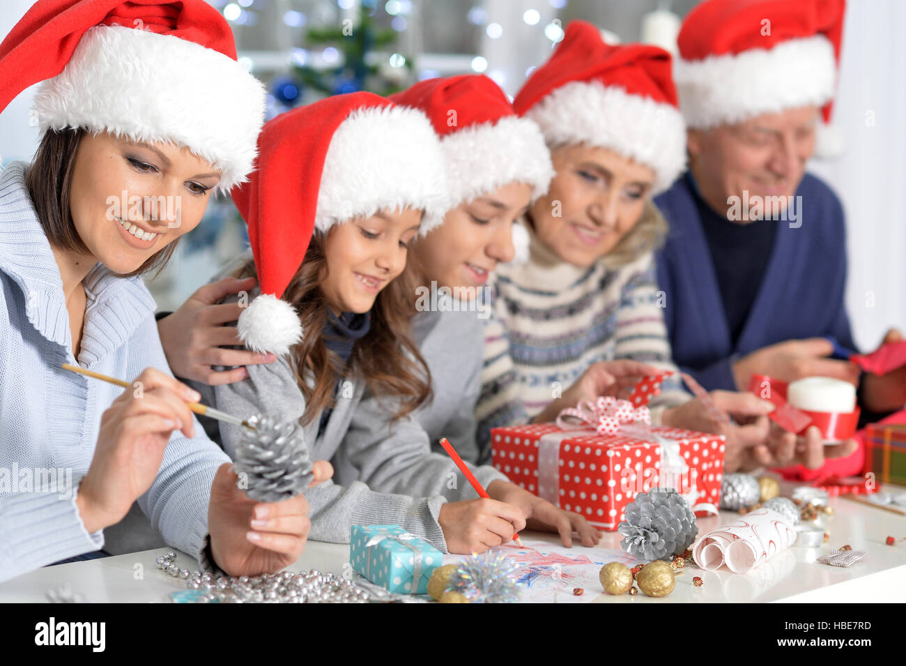 Family preparing for Christmas Stock Photo - Alamy
