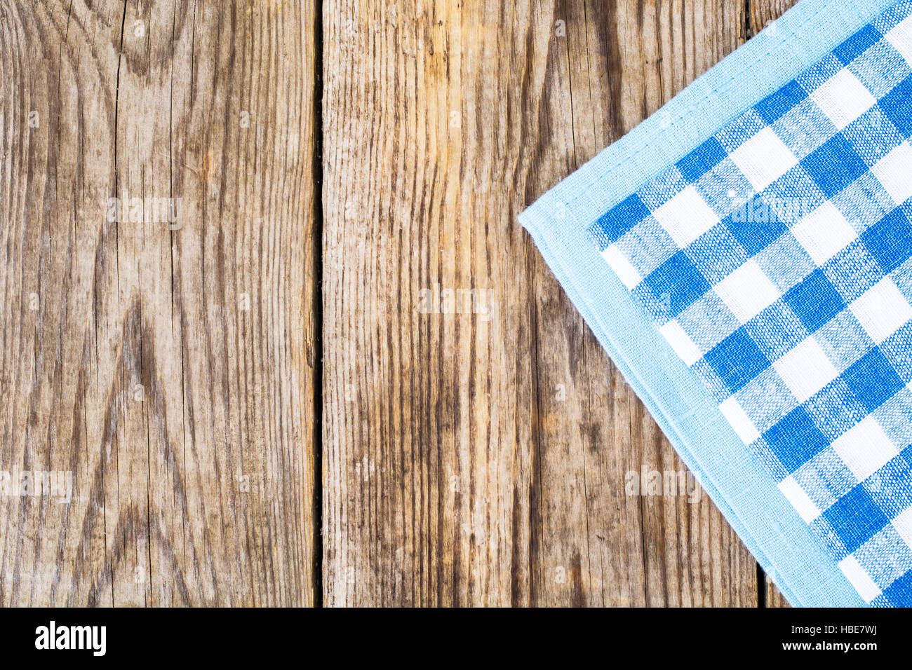 Napkins for table on background of old boards Stock Photo - Alamy
