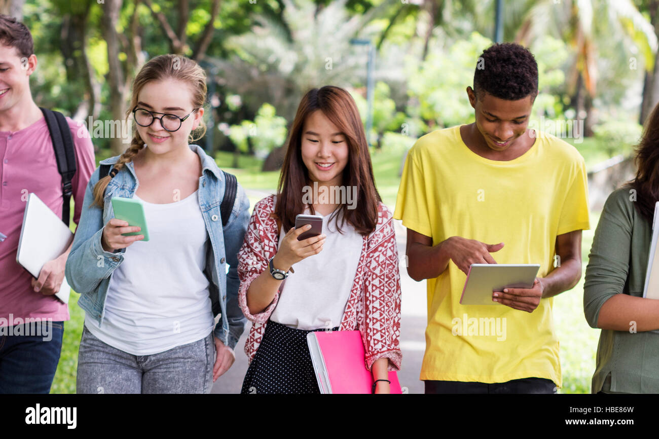 Diverse Young Students Book Outdoors Concept Stock Photo - Alamy