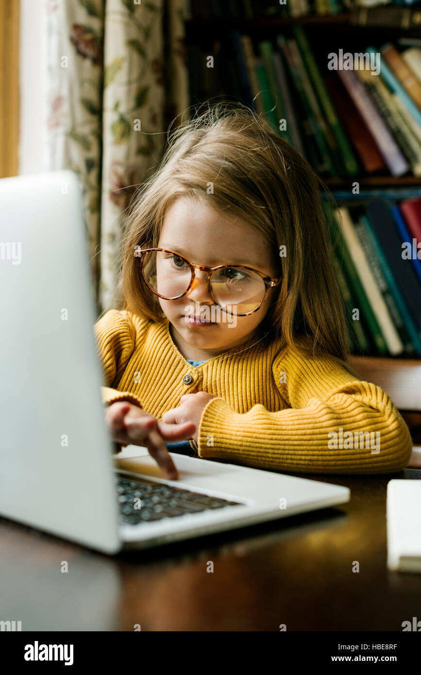 Little Girl Using Digital Laptop E-learning Concept Stock Photo - Alamy
