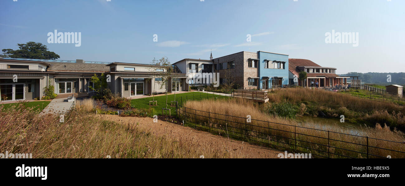 Panoramic view acoss hospice garden with inpatient wing and reception ...