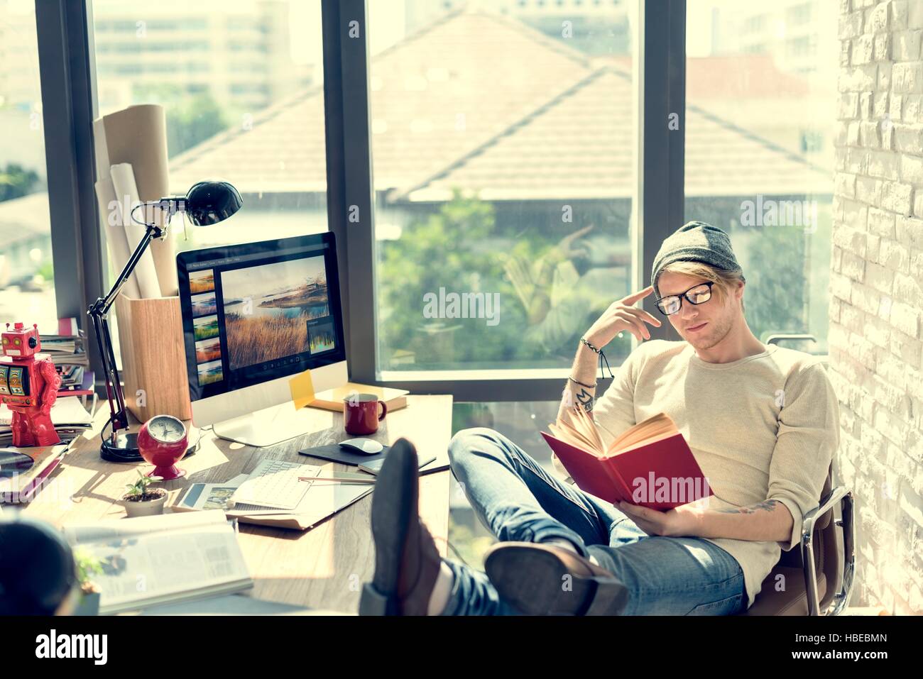Man Reading Book Knowledge Relax Concept Stock Photo - Alamy