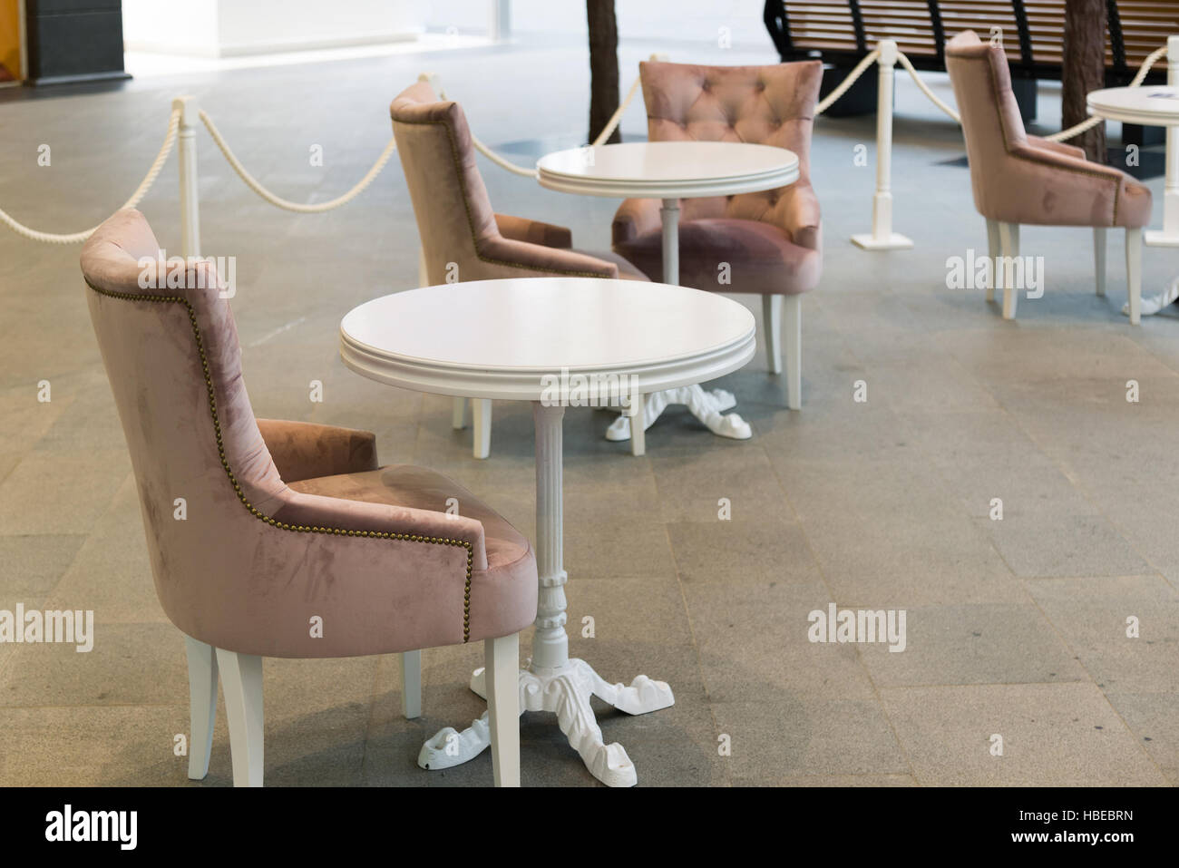 Empty Round table and chairs in cafe Stock Photo - Alamy