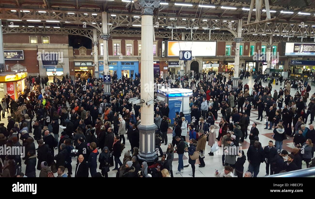Stranded commuters in London Victoria railway station, due to ...