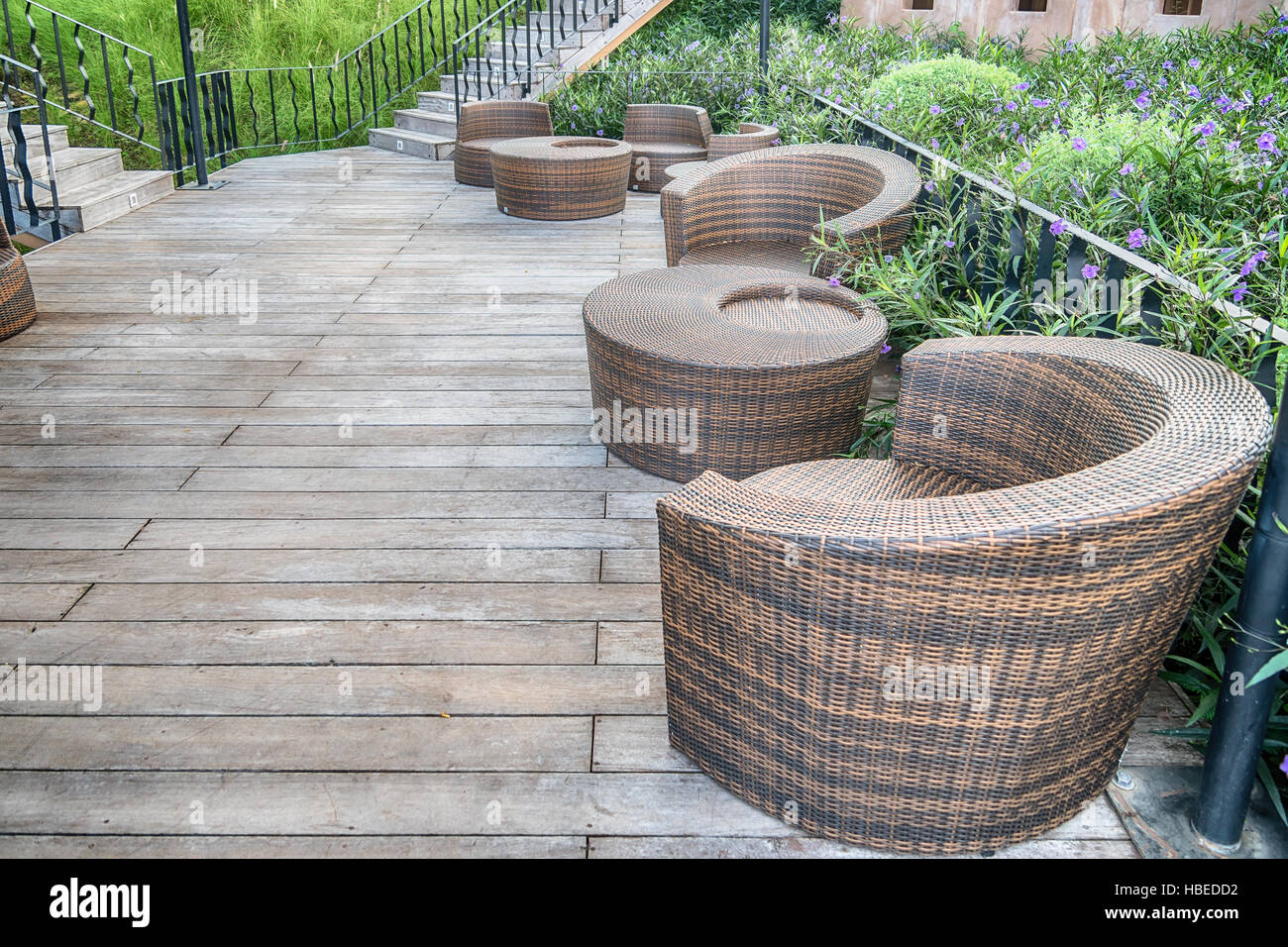 The wood table on natural outdoor of a restaurant with tree and cloudy ...