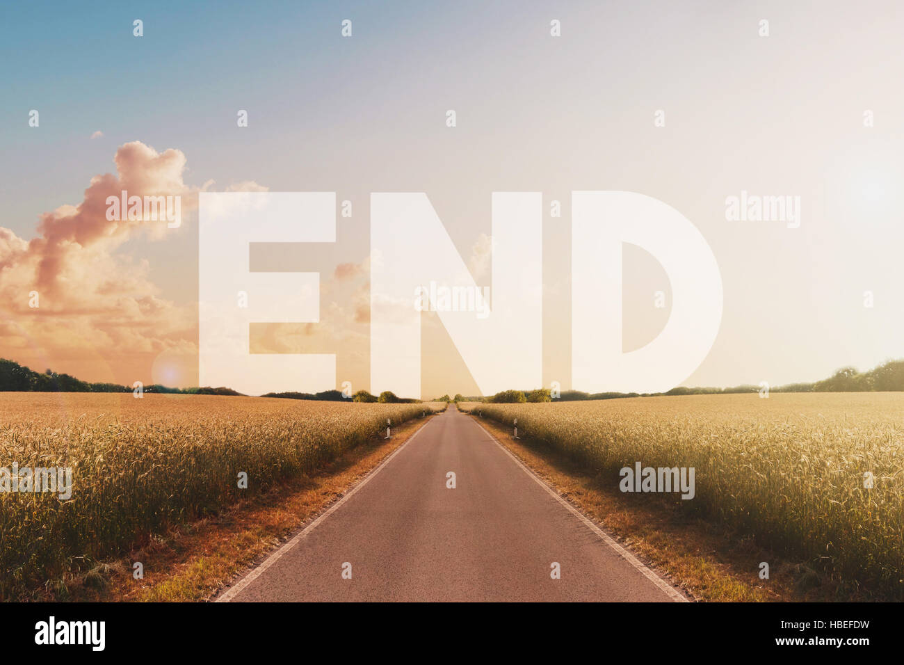 End in sight - text on horizon, end of empty road Stock Photo - Alamy