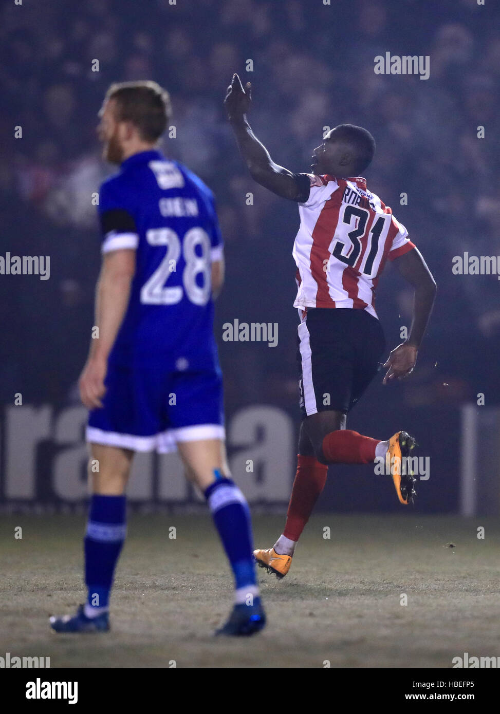 Lincoln City's Theo Robinson celebrates scoring his side's third goal ...