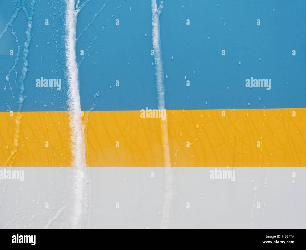 Ice frozen lines on triple colored wall Stock Photo - Alamy