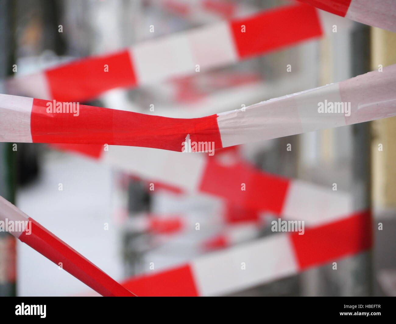 Barrier tape at building site Stock Photo - Alamy