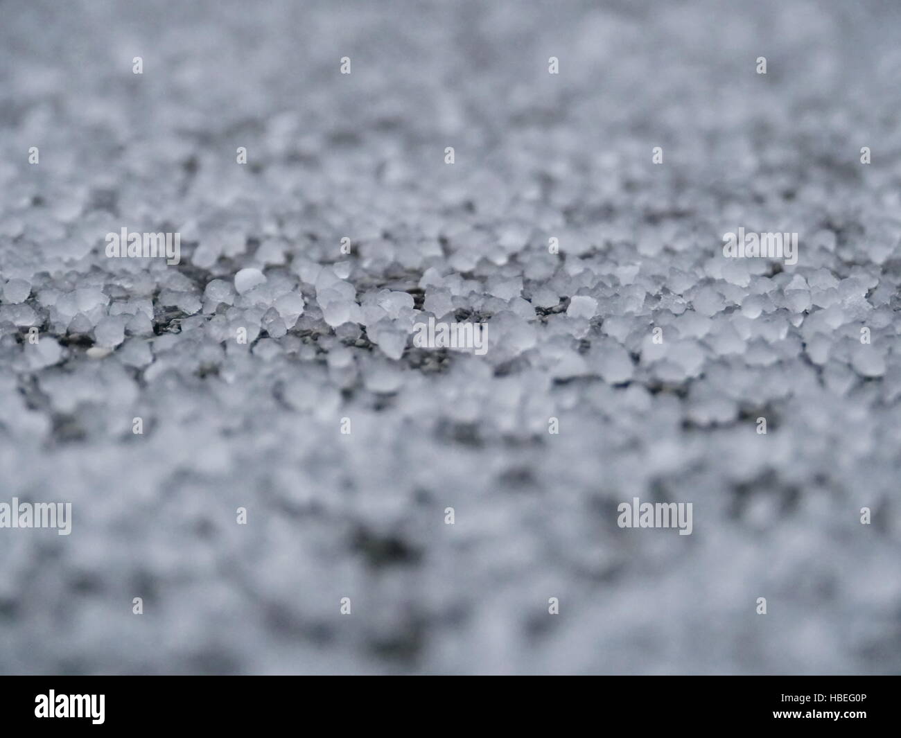 Ground covered with hail Stock Photo - Alamy
