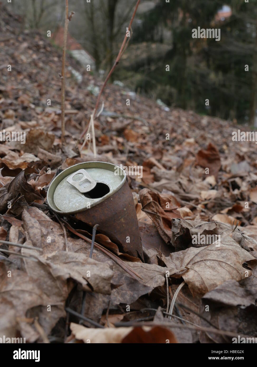 Old crushed rusty tin can hi-res stock photography and images - Alamy