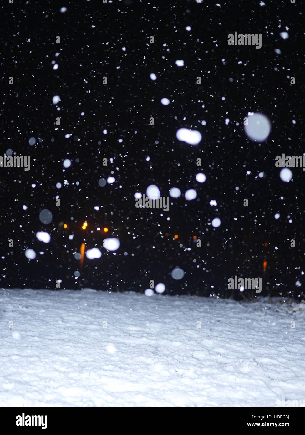 snowfall in the city at night Stock Photo - Alamy