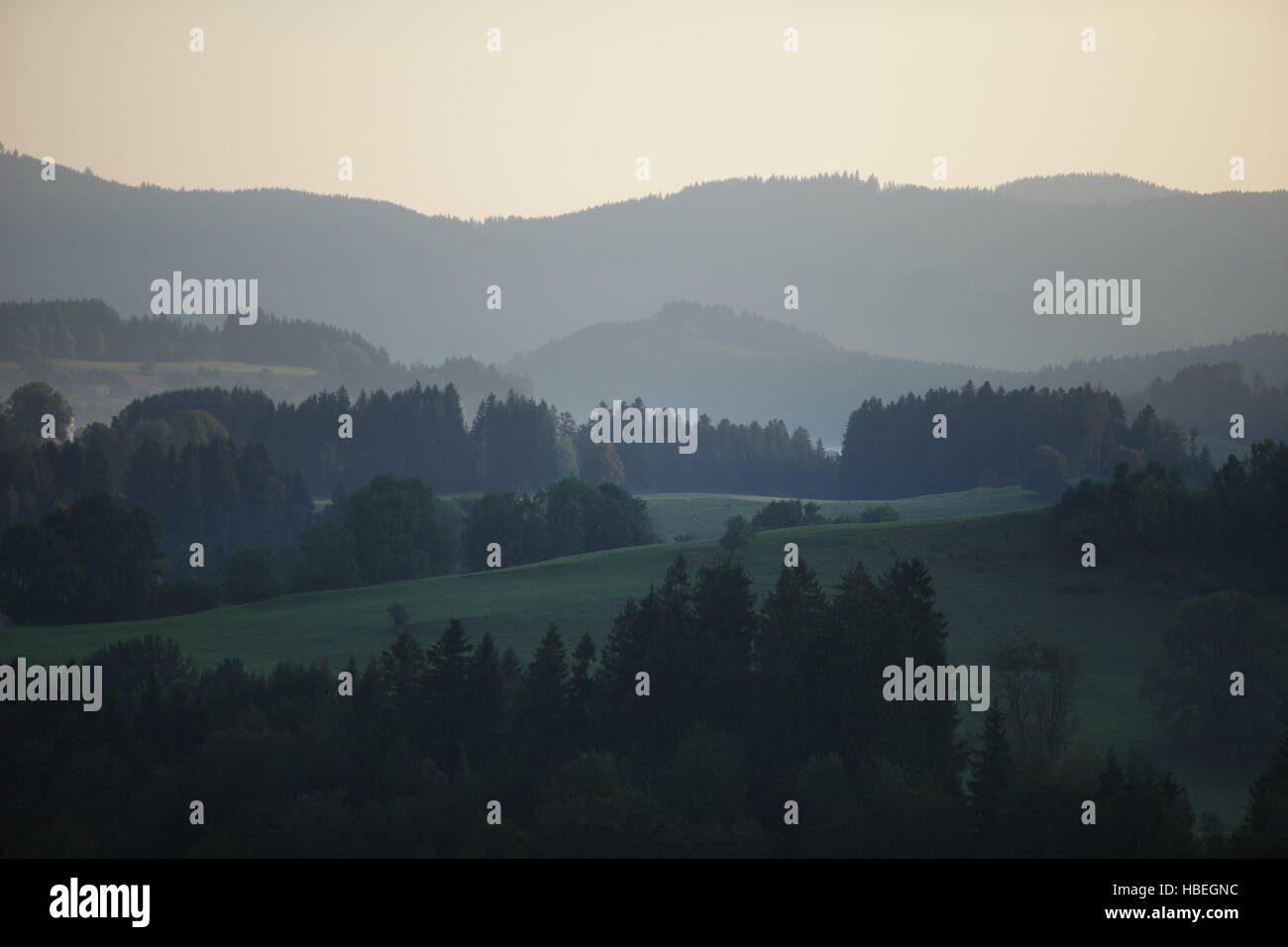 Far view of a valley after sunset Stock Photo - Alamy