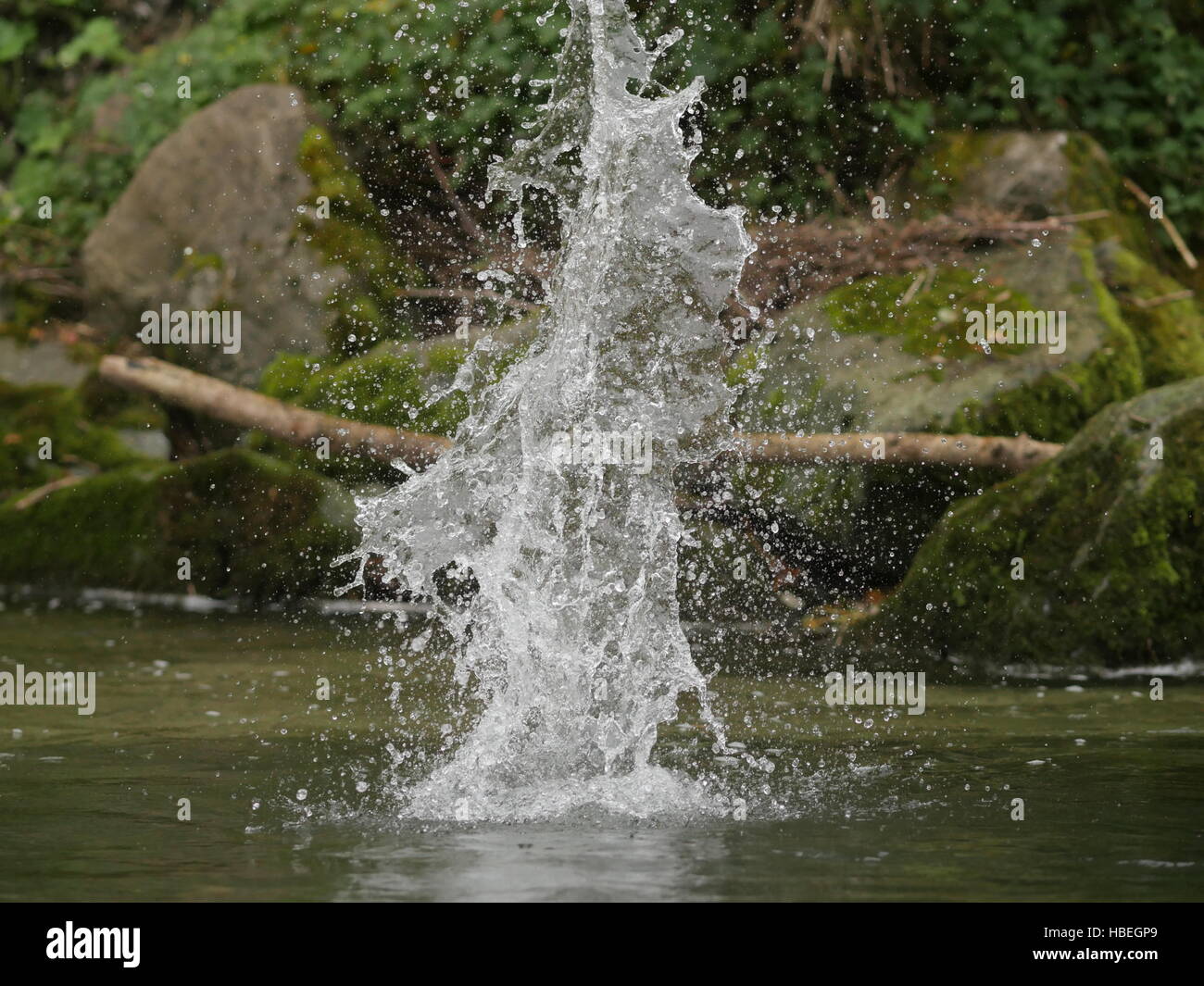 Water splash in natural basin Stock Photo - Alamy