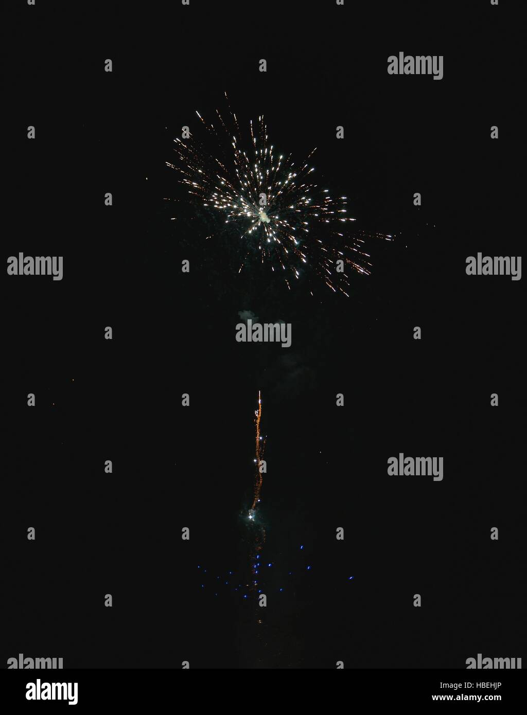 Shiny natural fireworks on dark black sky background with a little ...