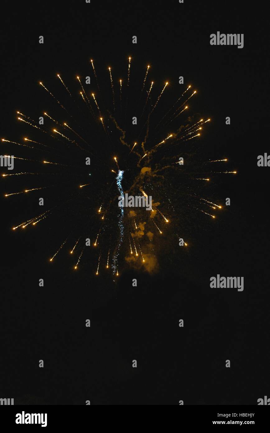 Shiny natural fireworks on dark black sky background with a little ...