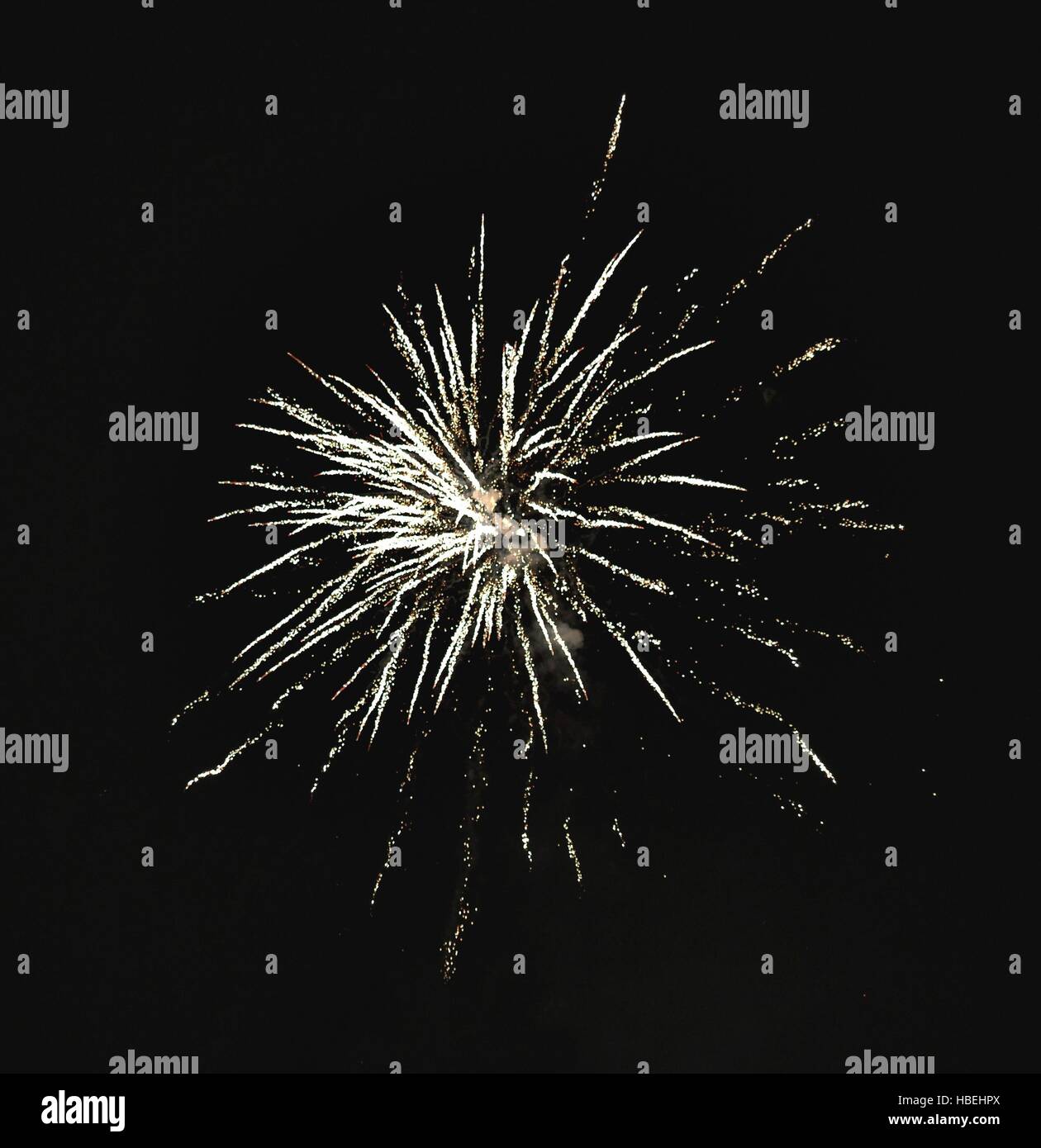 Shiny natural fireworks on dark black sky background with a little ...