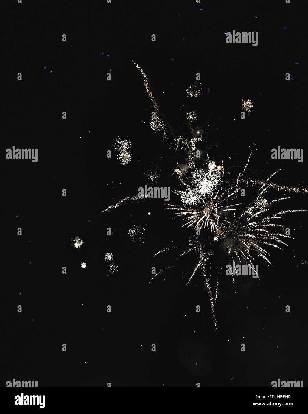 Shiny natural fireworks on dark black sky background with a little ...