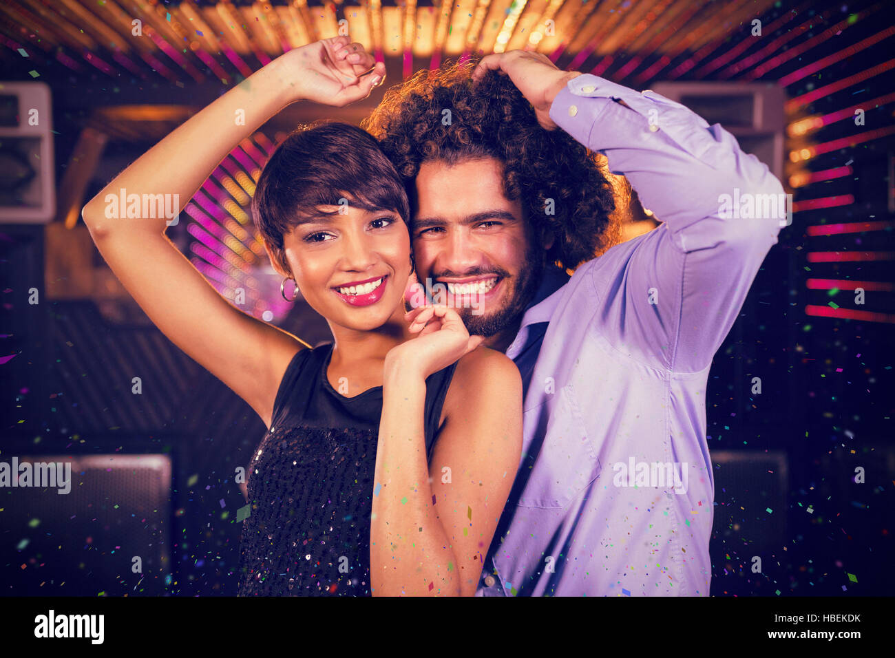 Composite image of cute couple dancing together on dance floor Stock ...