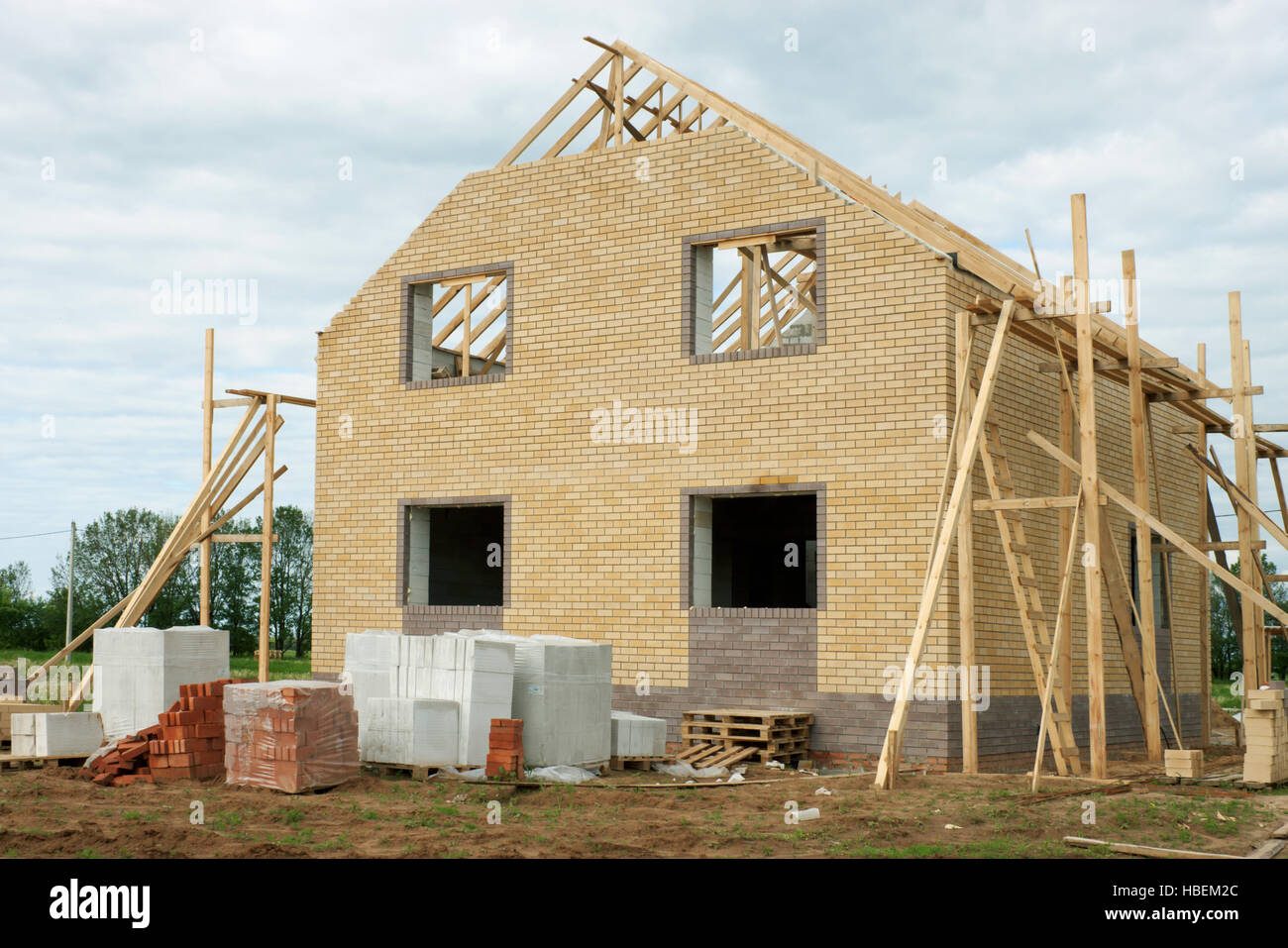 Brick house under construction Stock Photo - Alamy
