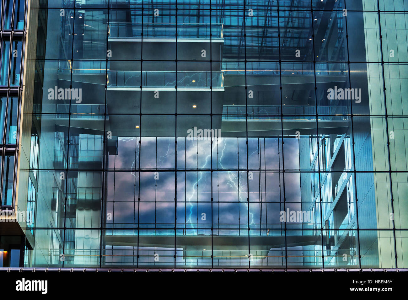 Office building with a thunderstorm Stock Photo - Alamy