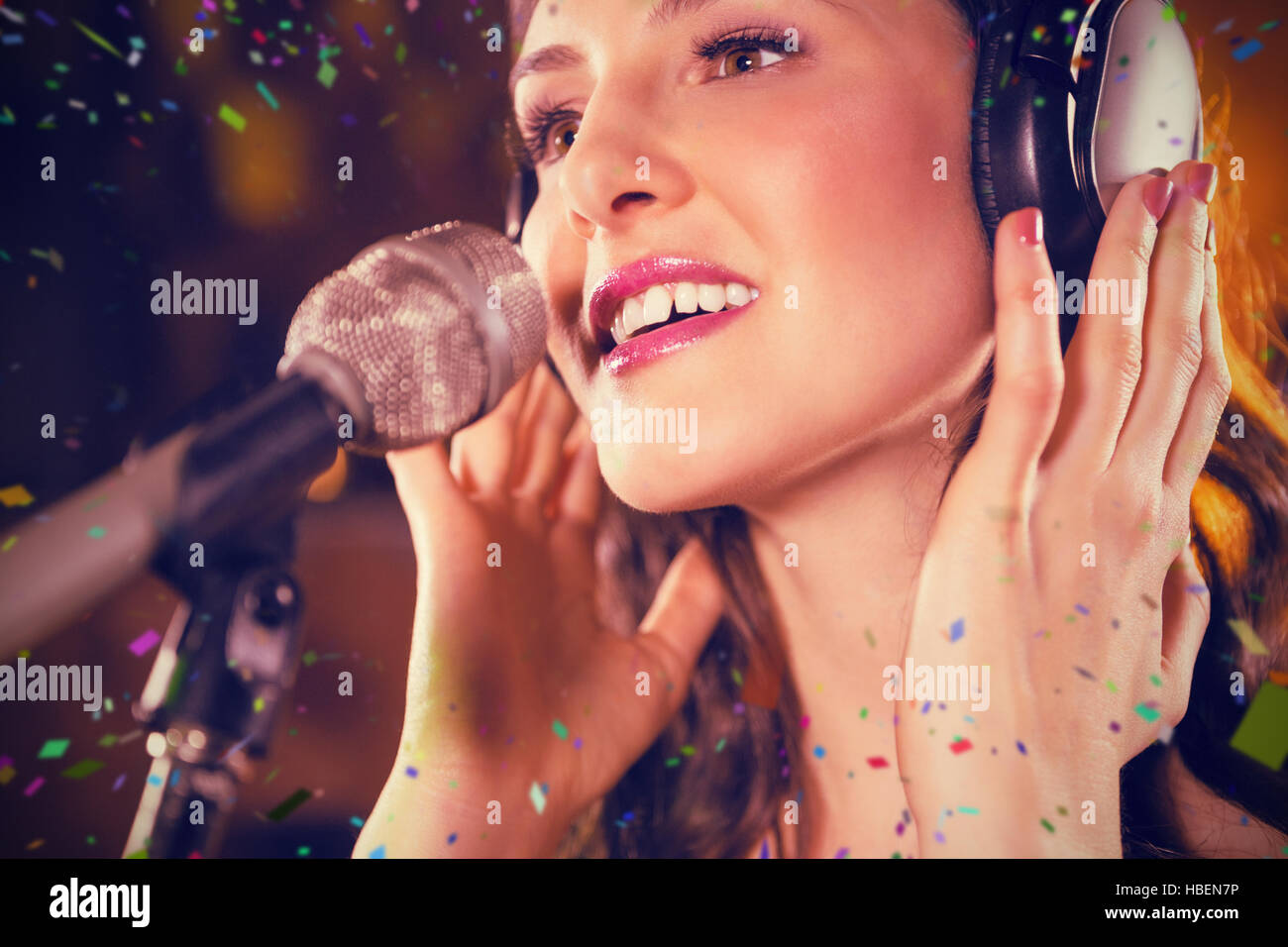 Woman singing song in microphone hi-res stock photography and images ...