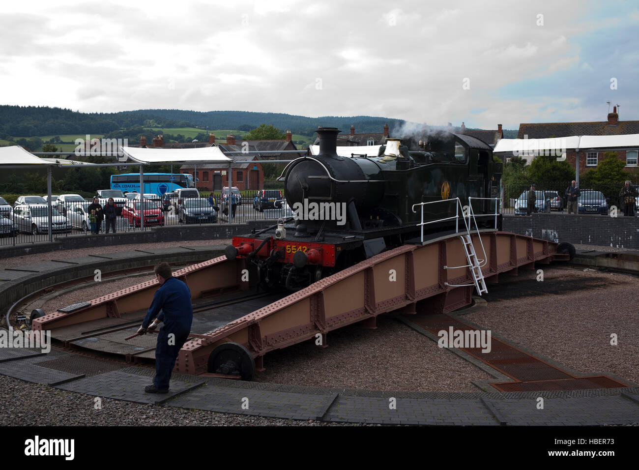 steam locomotive being turned on a railway turntable on the Minehead ...