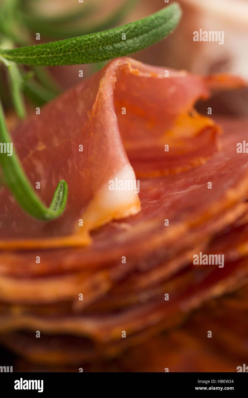 a pile of different spanish embutido, jamon, chorizo and lomo embuchado ...