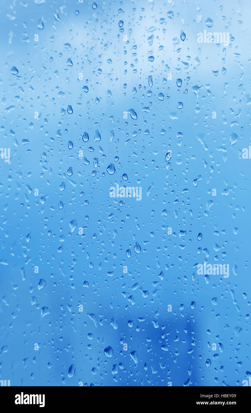 Drops water fall on blue hi-res stock photography and images - Alamy
