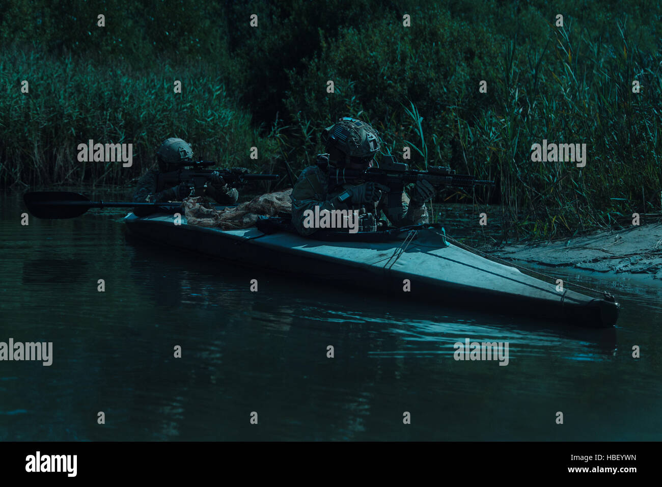 Spec ops in the military kayak Stock Photo - Alamy