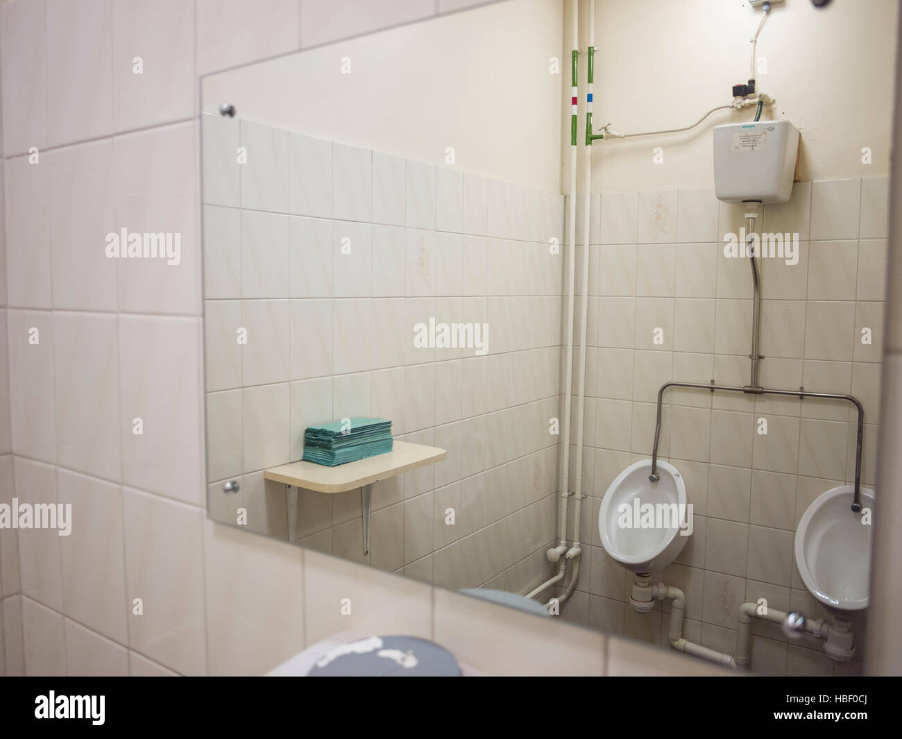 Toilet urinals urinal tiles hi-res stock photography and images - Alamy