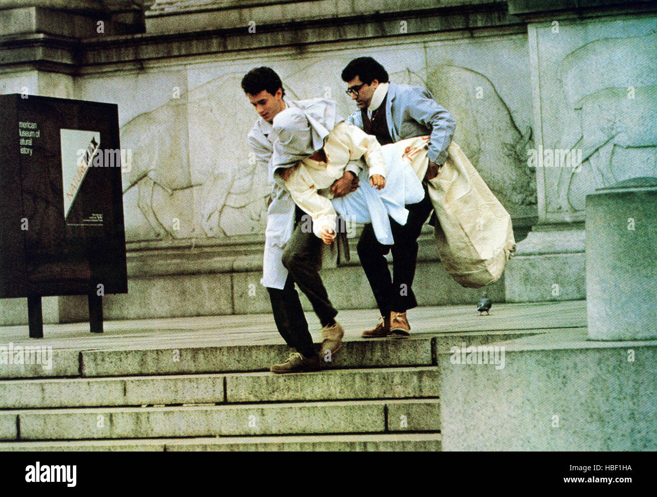 SPLASH, from left: Tom Hanks, Eugene Levy, Darryl Hannah 9being carried ...